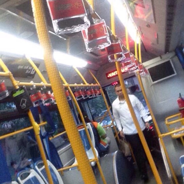 Green Frog Hybrid Bus - Bus Station