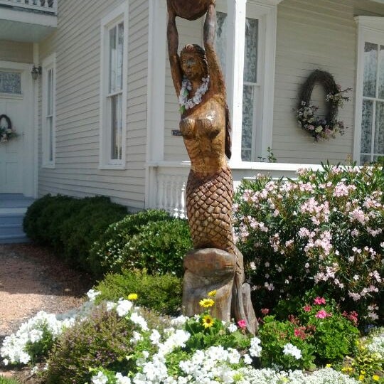 Mermaid Holding Clam Shell Tree Sculpture - East End Historic District ...
